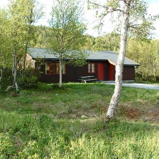 Arabu Hyttegrend 1-Møsstrond/Rauland. Elbillader på hytteveggen ...